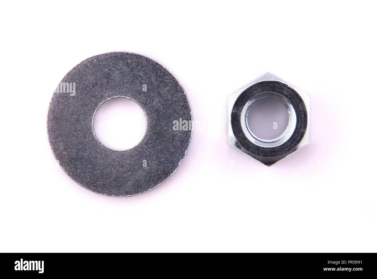 Flat metal washers and nut isolated on a white background Stock Photo ...