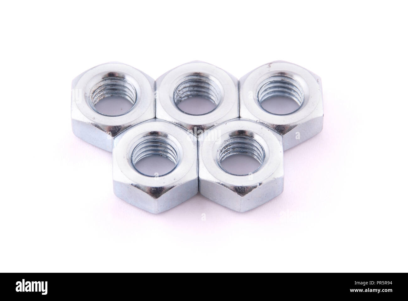 Flat metal nut isolated on a white background Stock Photo - Alamy