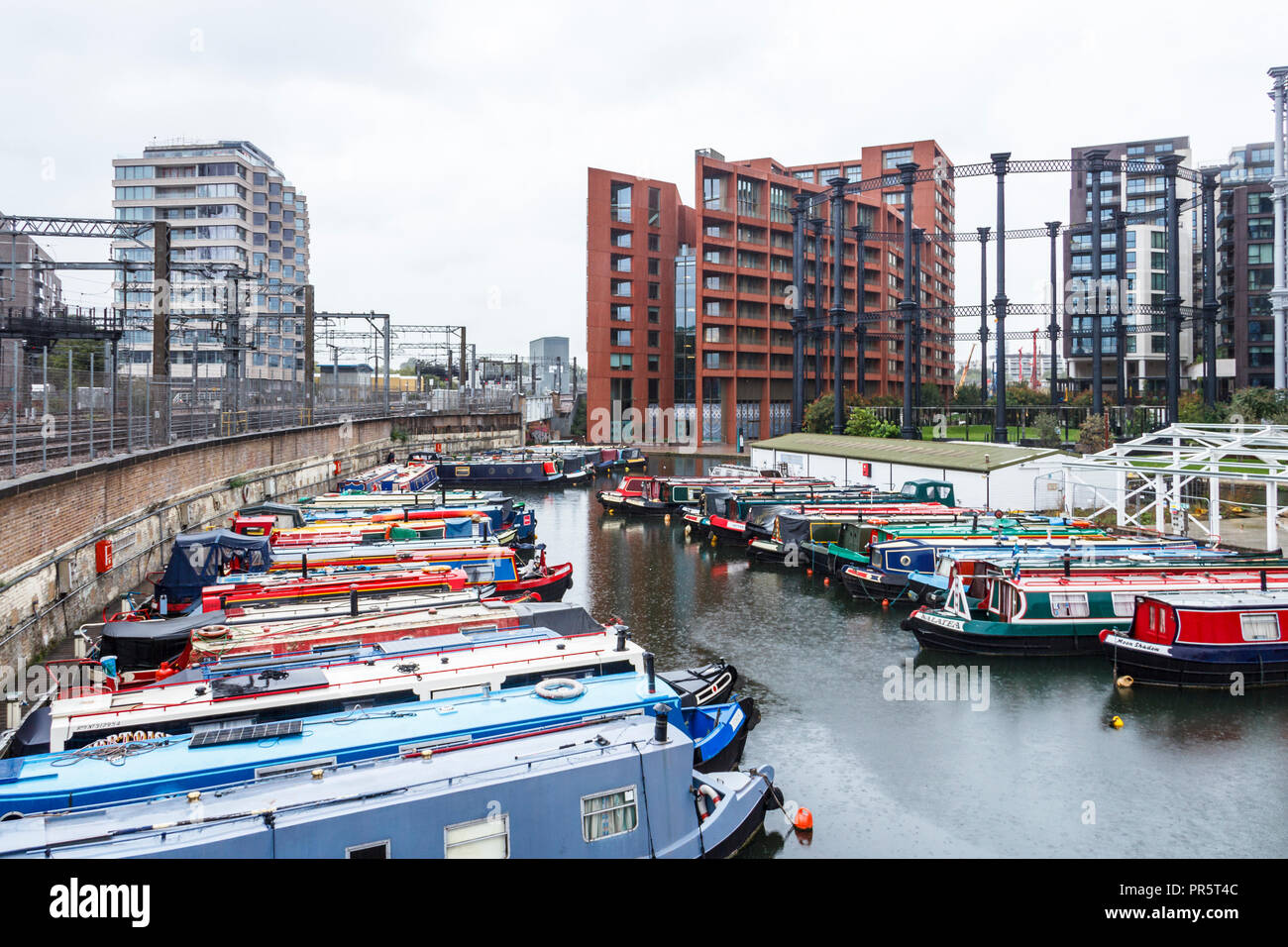 Narrowboats moored in The St. Pancras Basin of Regent's Canal, next to ...