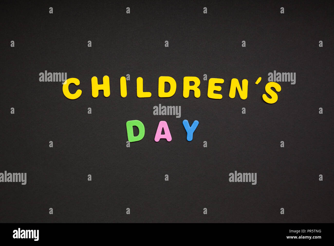 Creative colorful text made from plastic letters Children's day writing ...