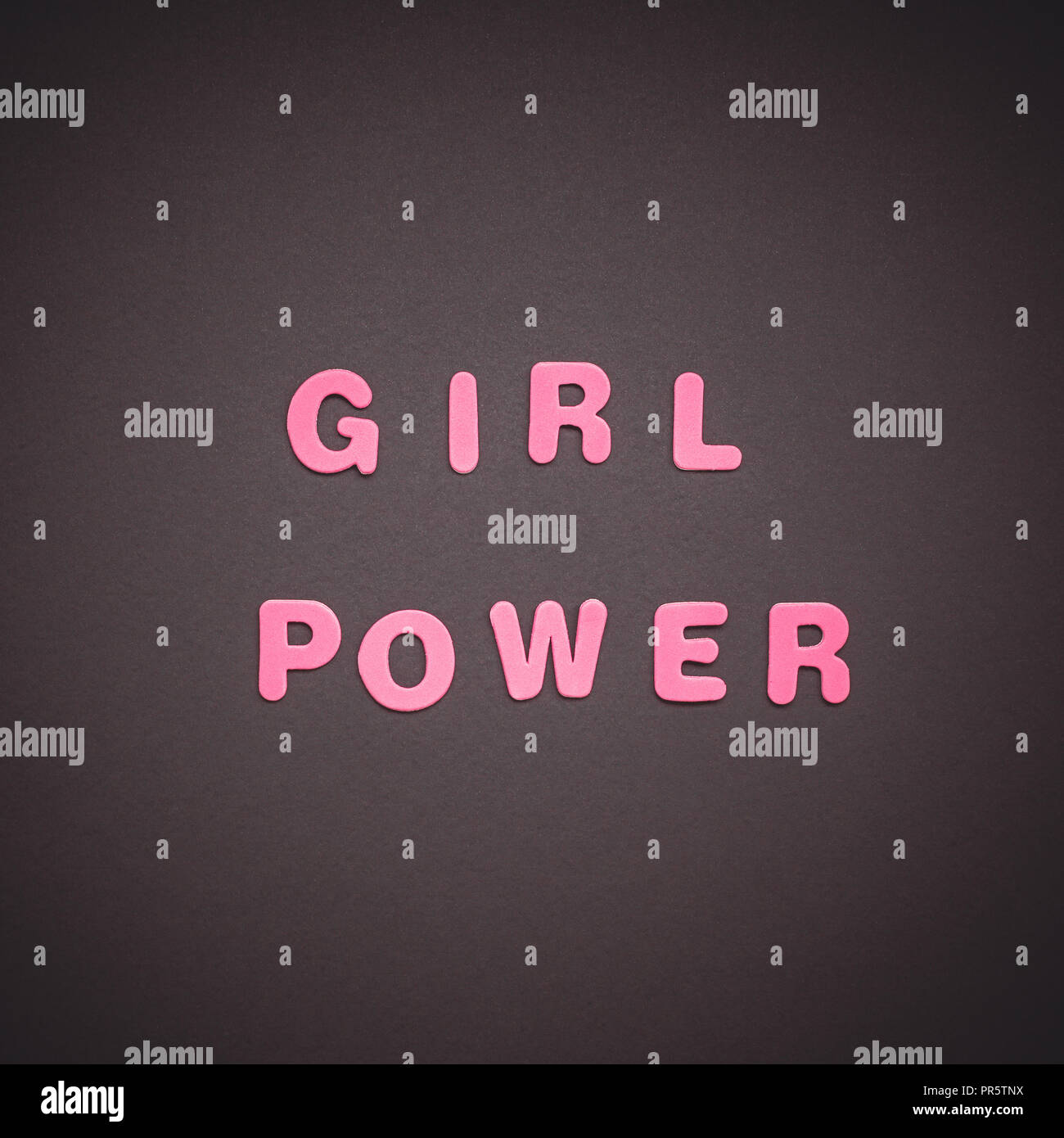 Creative pink text made from plastic letters GIRL POWER writing on ...