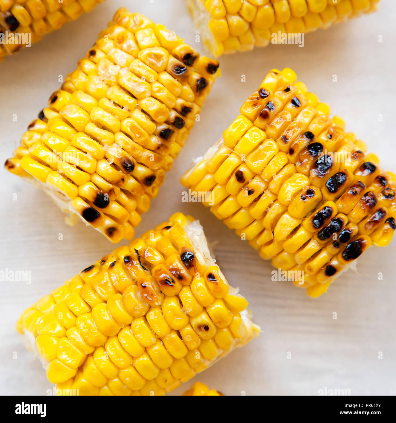 Grilled corn on the cob, overhead. Summer food. Top view, from above ...