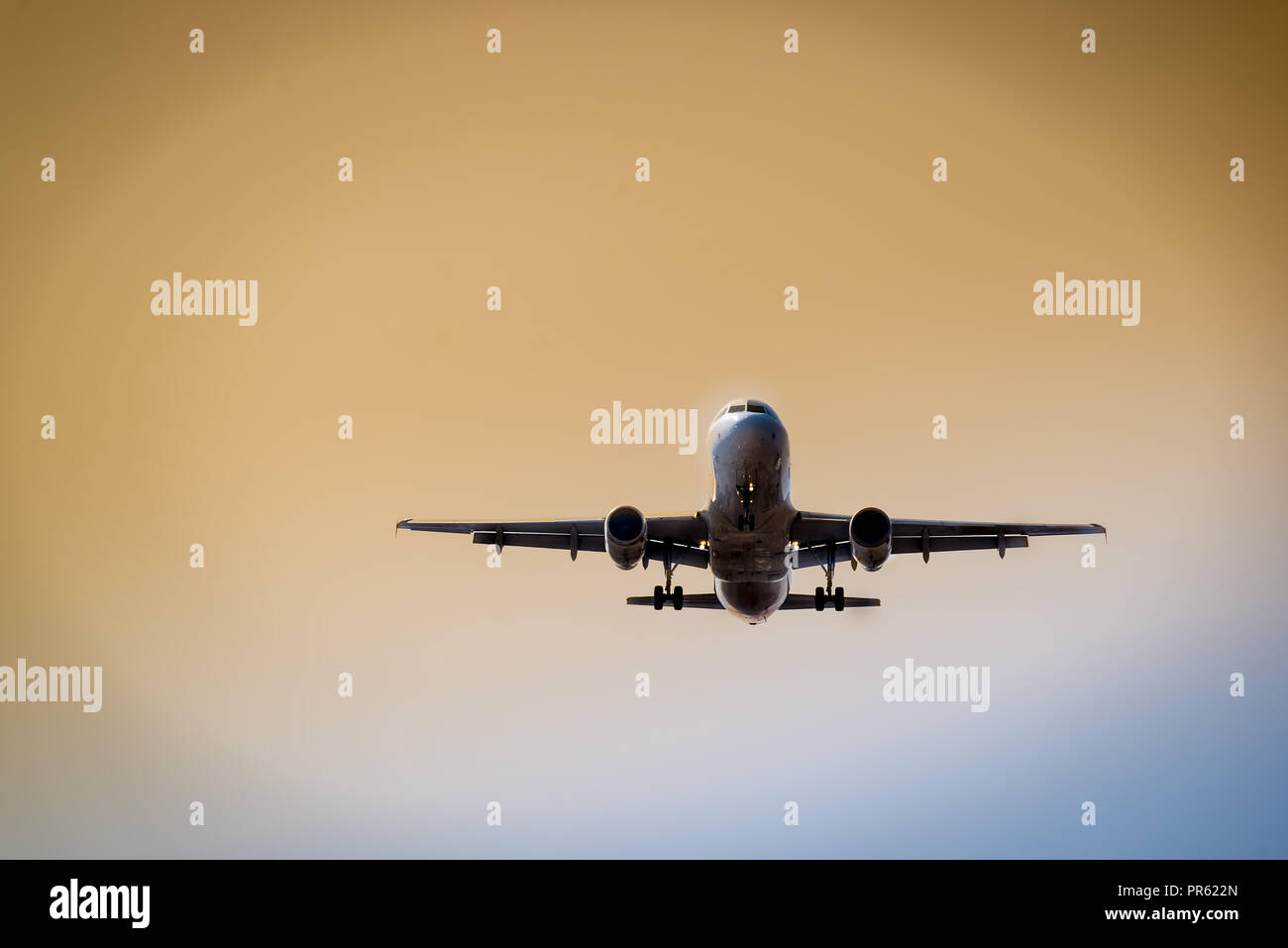 Airplane flying up high and departing from the airport Stock Photo - Alamy