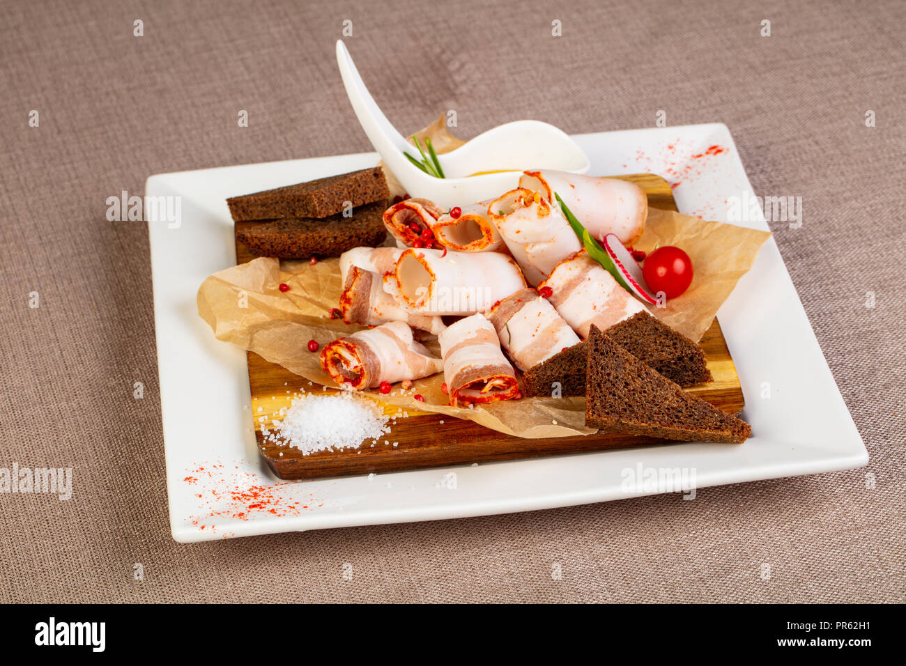 Pork fat plate with bread and onion Stock Photo - Alamy