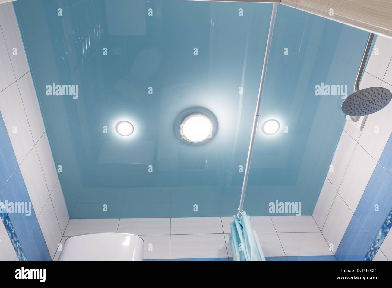 Blue stretch ceiling in the bathroom Stock Photo - Alamy