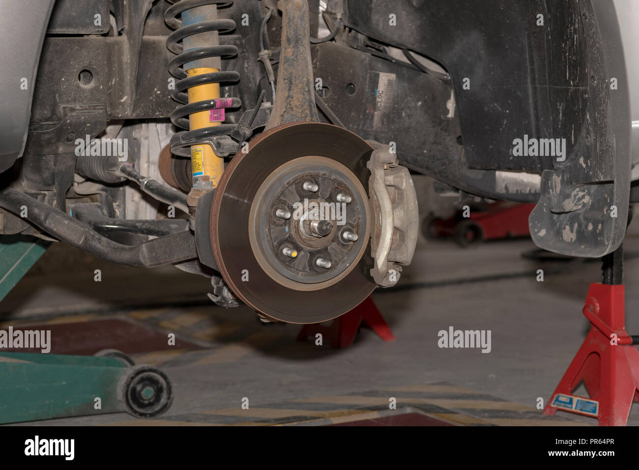 4x4 vehicle’s disk and brake system without a tire, tyres replacement ...