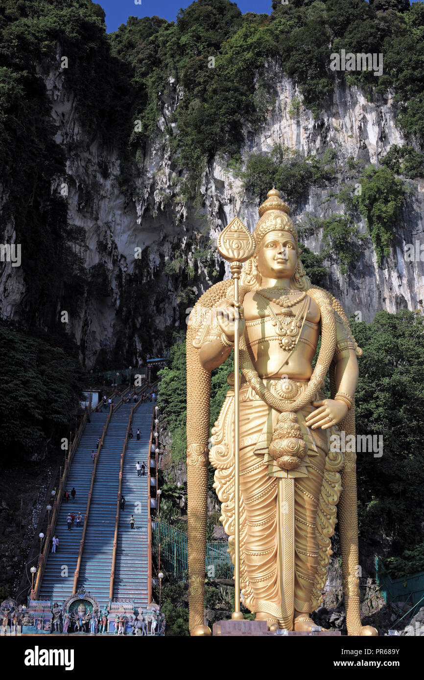 Lord Murugan statue and Batu Caves steps in Selangor, Malaysia Stock ...
