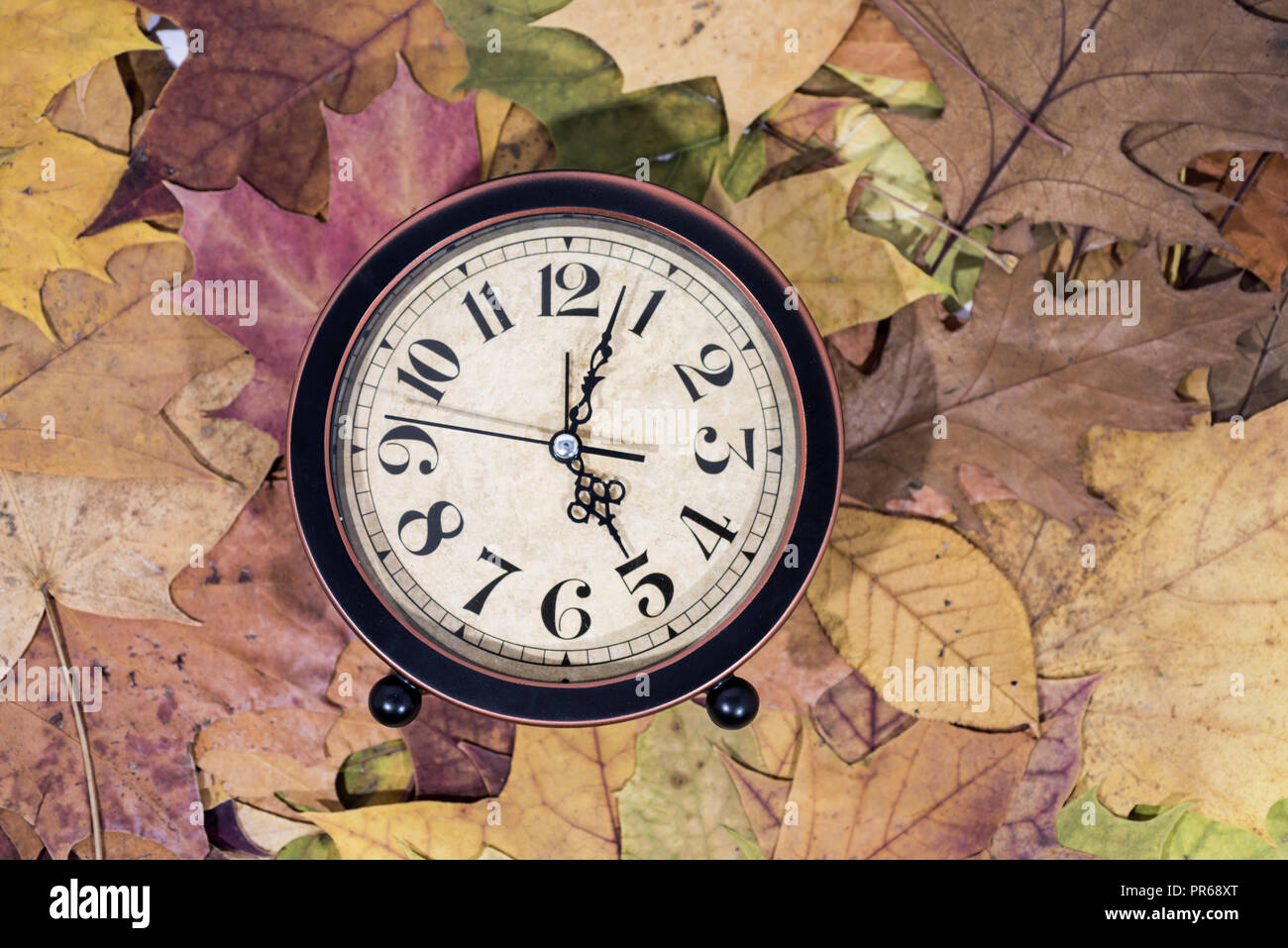 Daylight Saving Time. Wall Clock going to winter time. Autumn ...