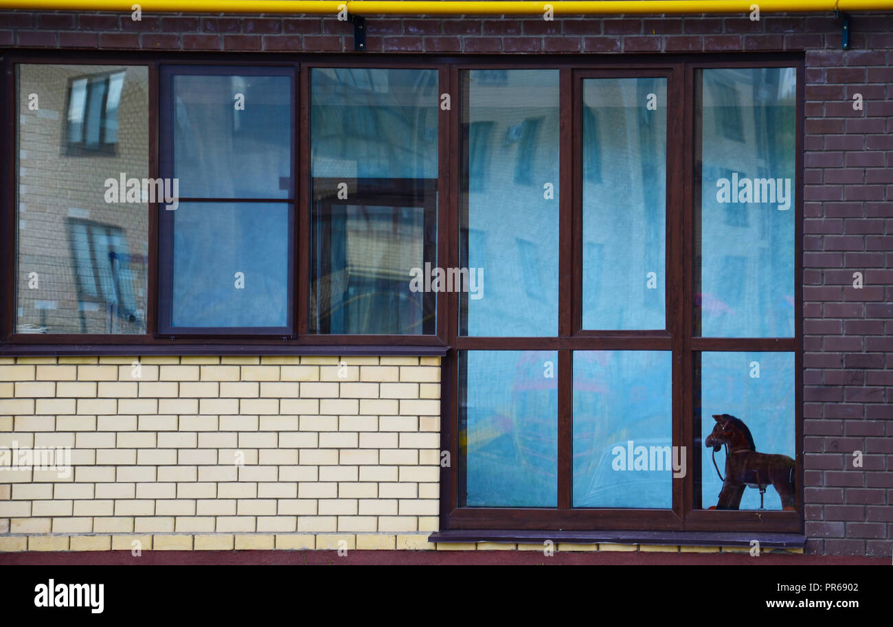 Minimalistic simplicity building with windows, balconies, bricks and ...