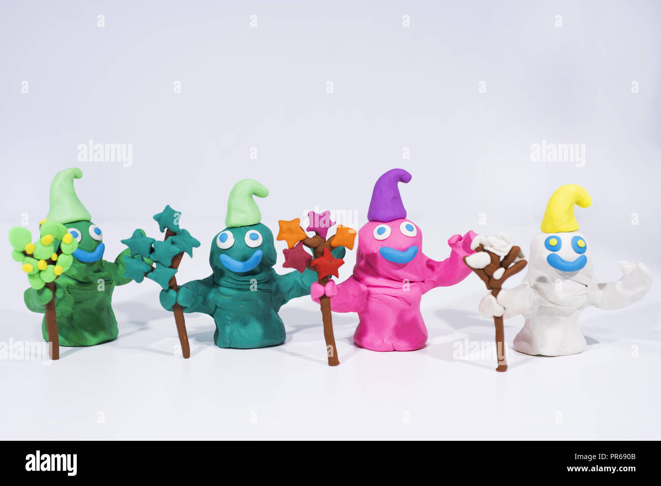 Funny figures made from Play Clay. Year seasons abstraction Stock Photo ...