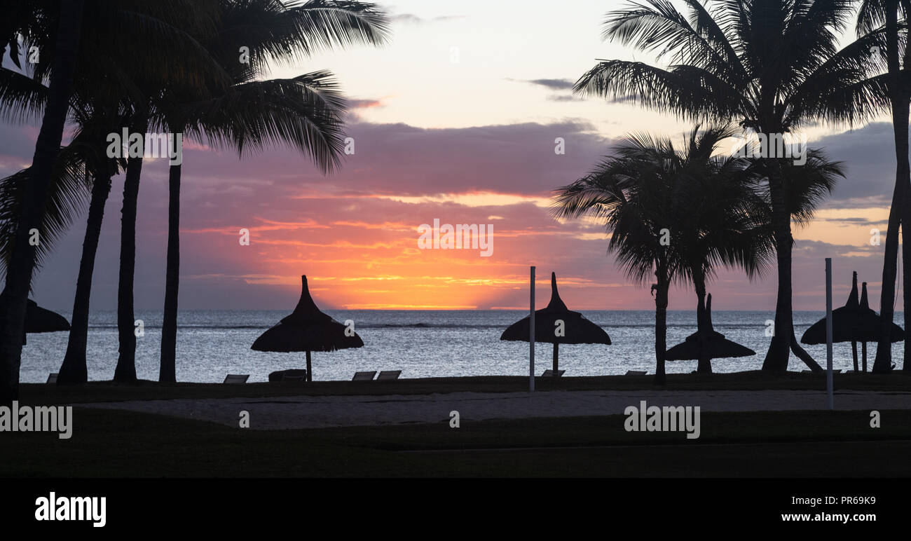 Sunset as seen from Sugar Beach resort, Flic en Flac, Mauritius Stock ...