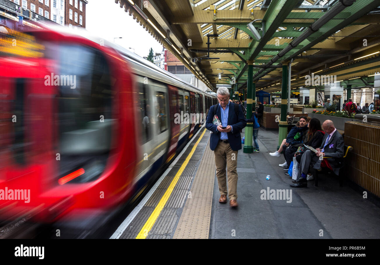 Old man waiting for his train hi-res stock photography and images - Alamy