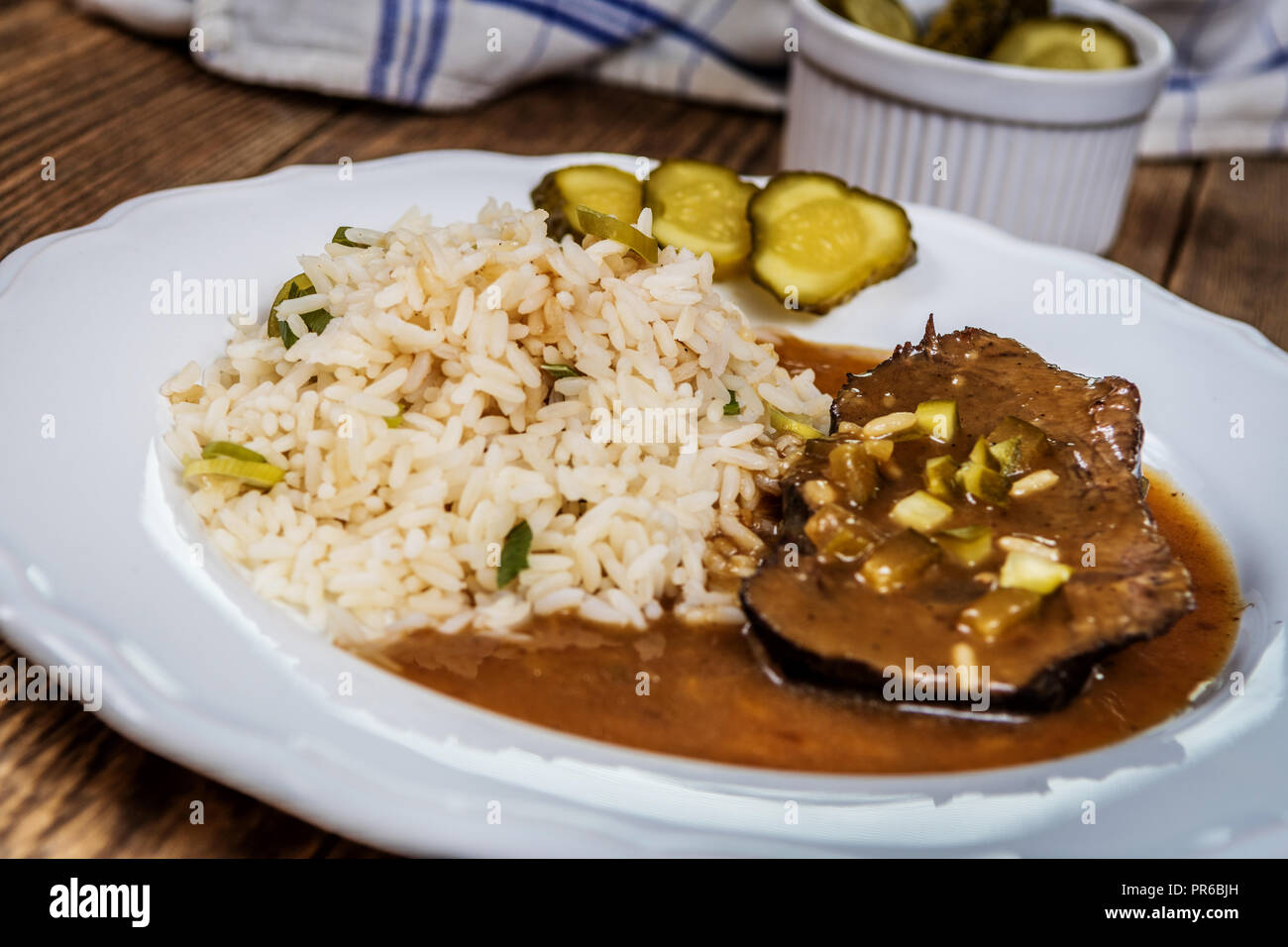 Czech traditional food Znojmo's sauce with gherkin and pork meat and ...