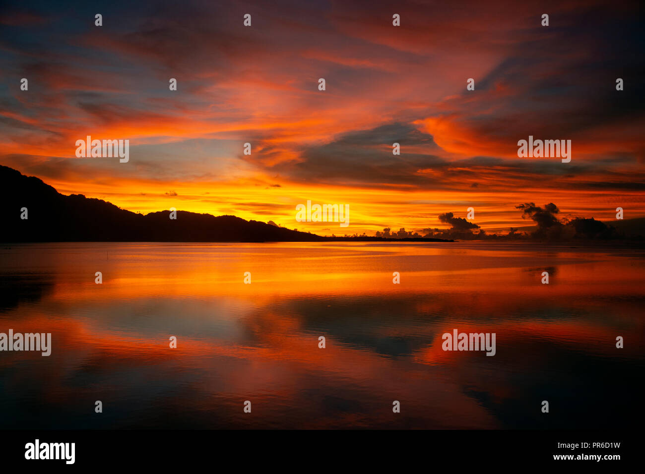 Golden sky with clouds at sunset, U district, Pohnpei, Federated States ...
