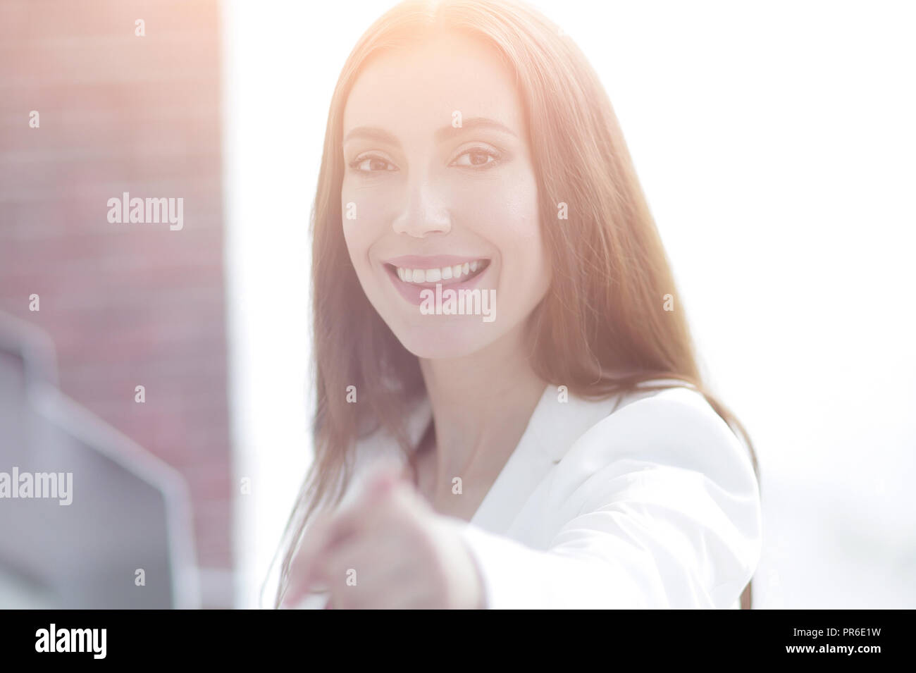 confident business woman pointing finger forward Stock Photo - Alamy