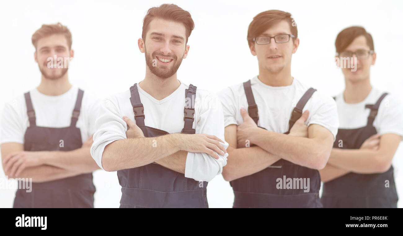 Happy team of responsible movers and their smiling leader Stock Photo ...