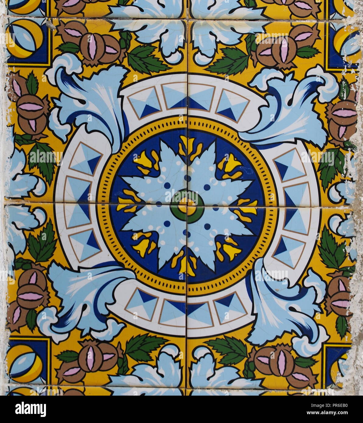 Detail of the traditional tiles from facade of old house. Decorative ...