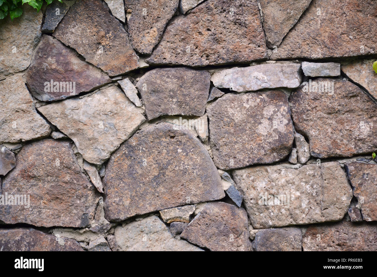 Stone wall background Stock Photo - Alamy