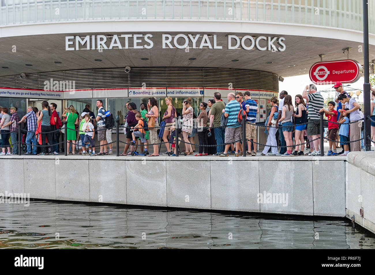 People in a queue at Emirates Royal Docks Greenwich London UK Stock ...