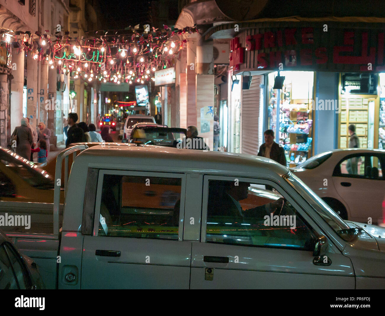 Evening lights on streets of Latakia, Syria Stock Photo - Alamy