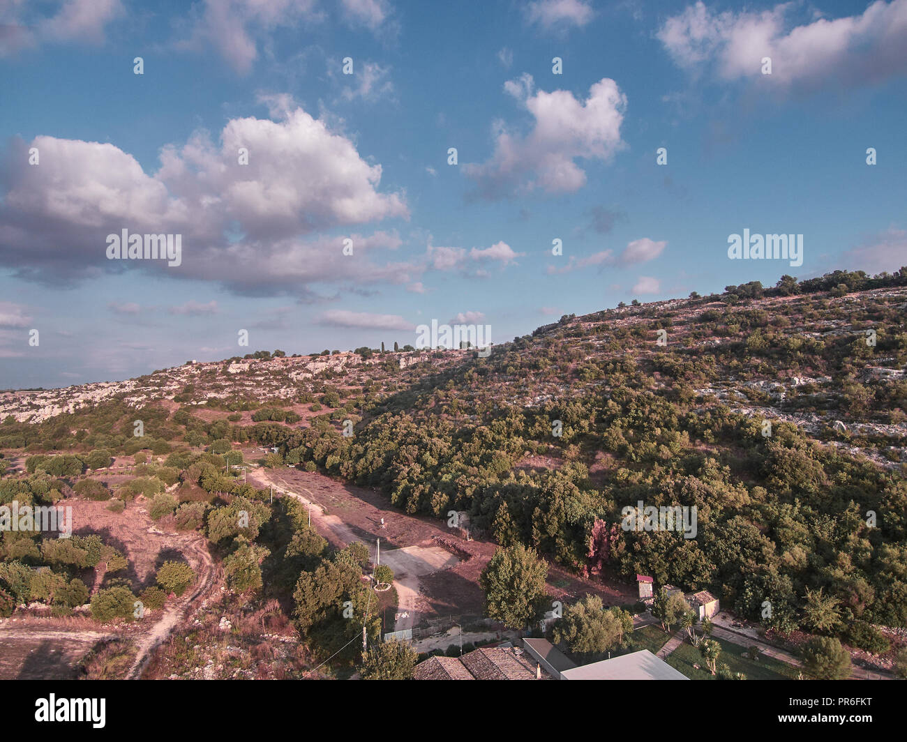Aerial view of the "Cava", a natural cave in Sicily during a summer day ...