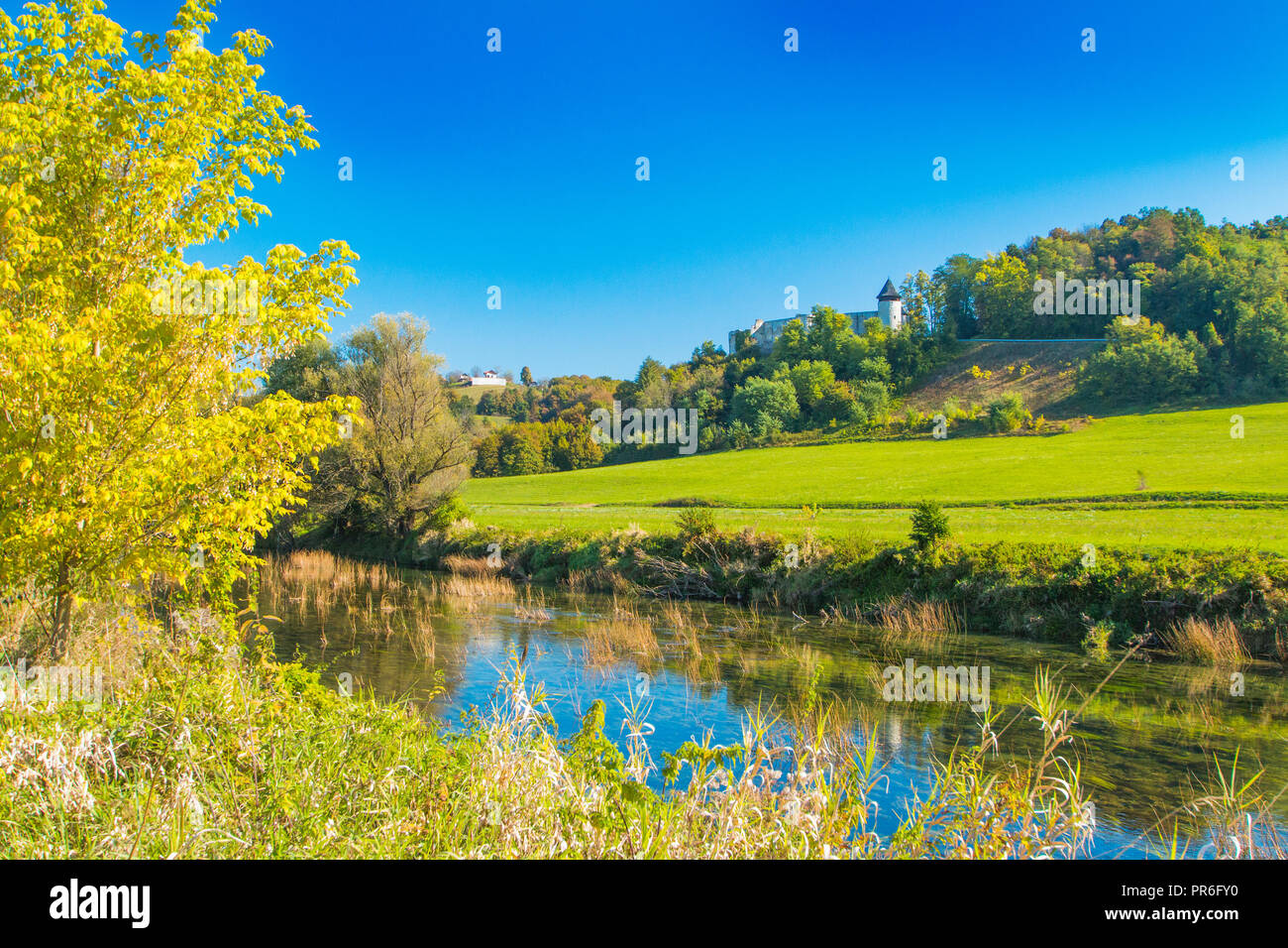 Croatia, countryside landscape, river Dobra and old fortress in ...
