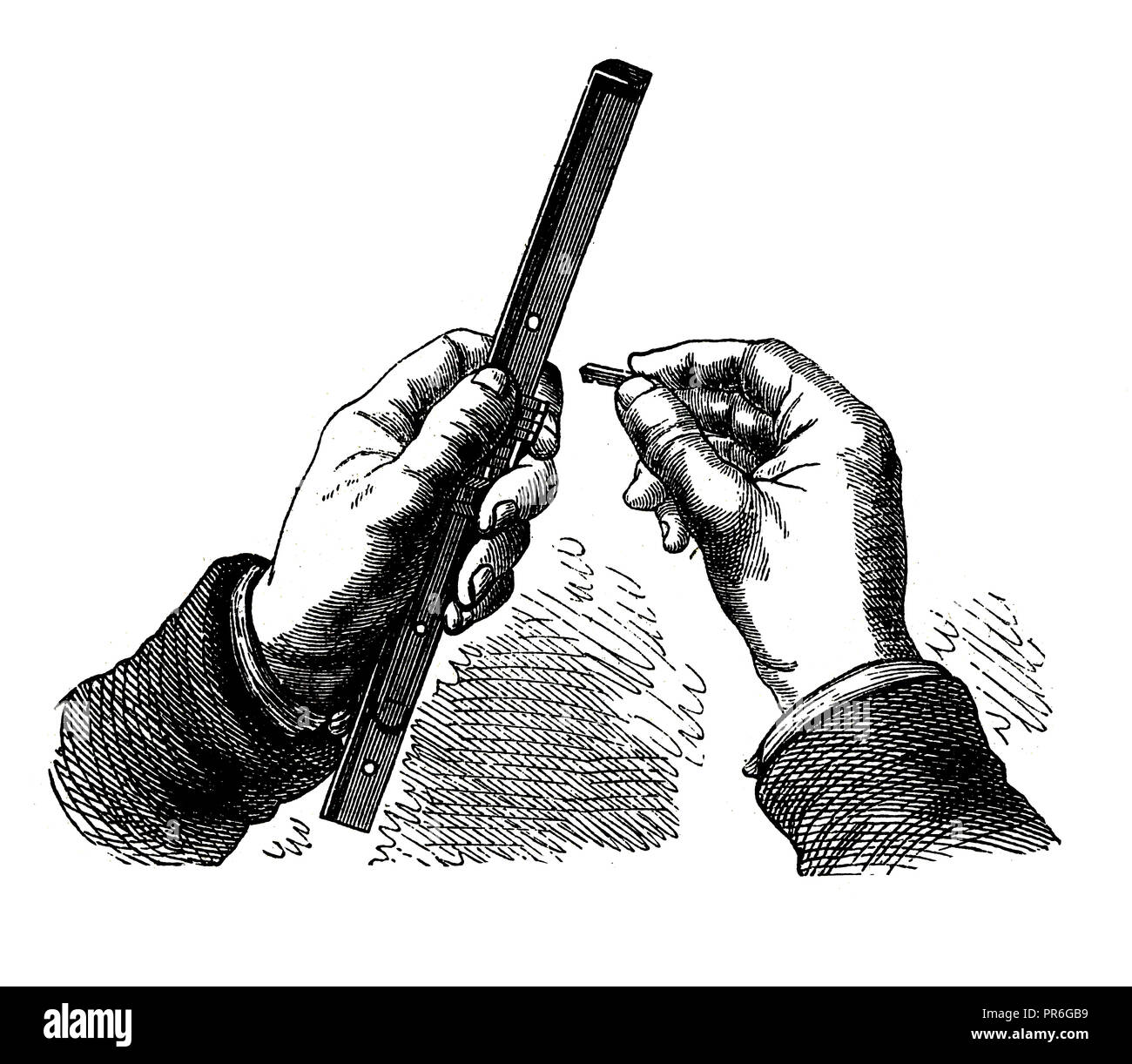 19-th century illustration of composing stick loaded with movable types ...