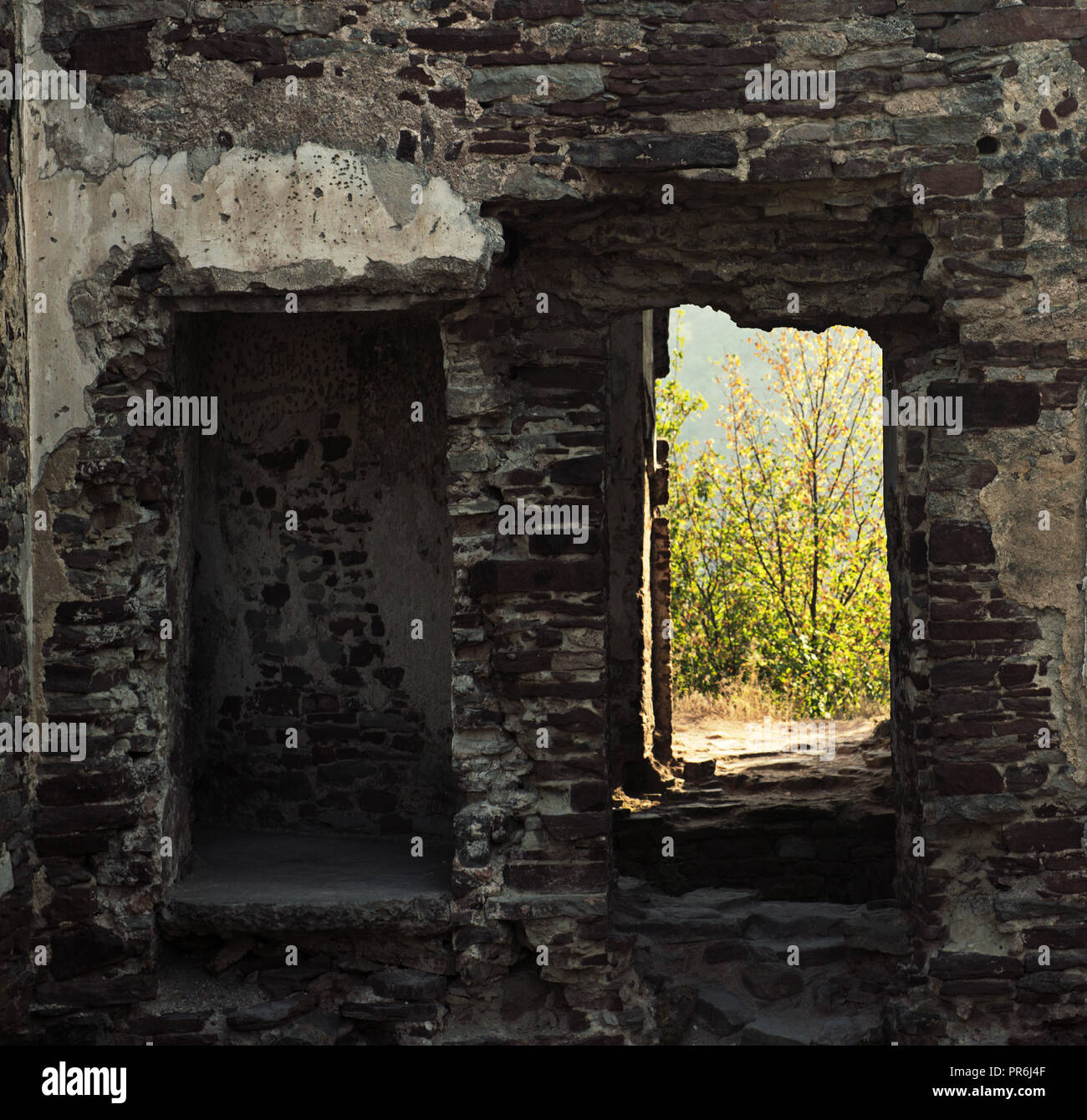 Old wall with breach Stock Photo - Alamy