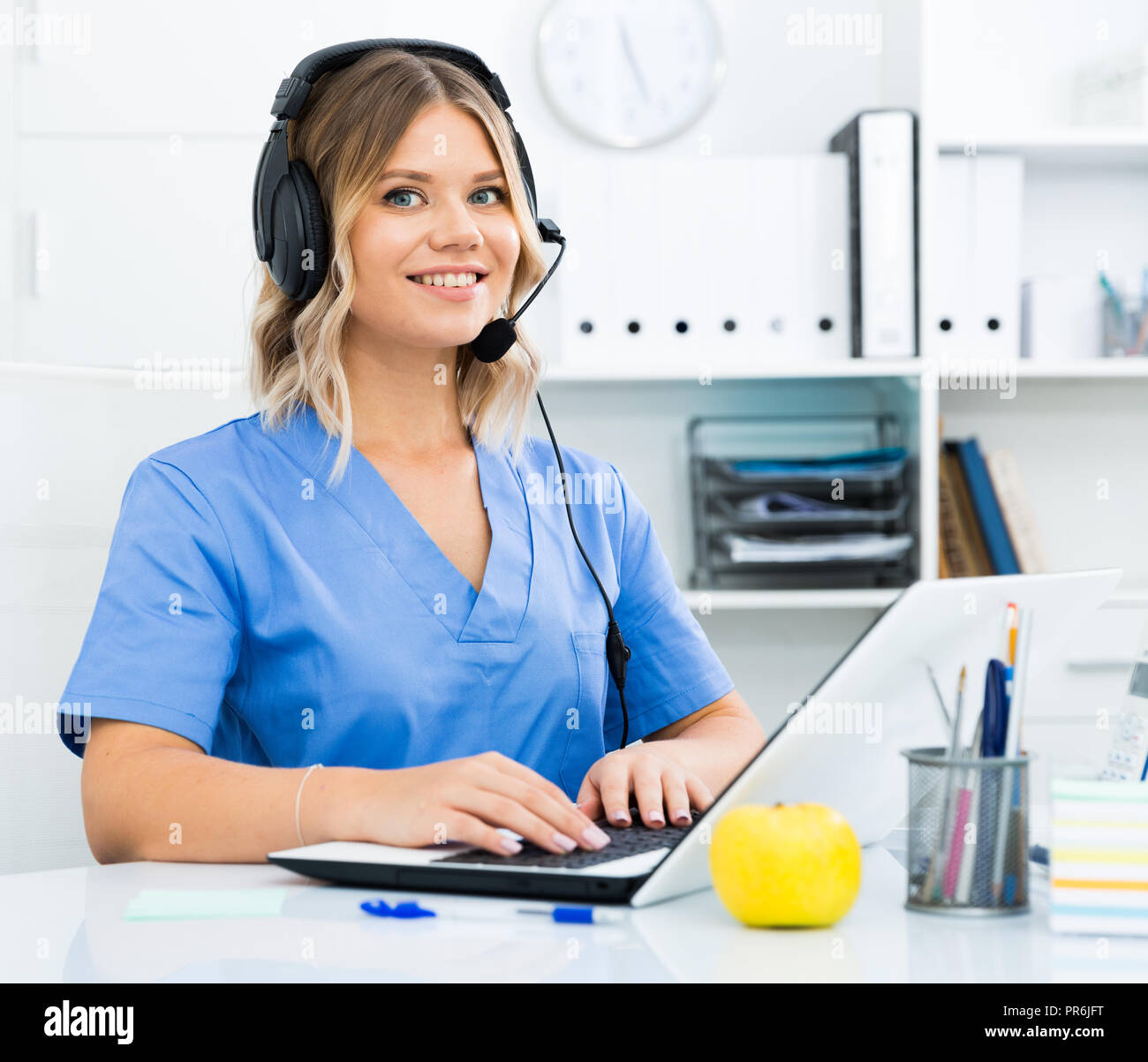 Ready to help specialist medical call center in headphones with ...