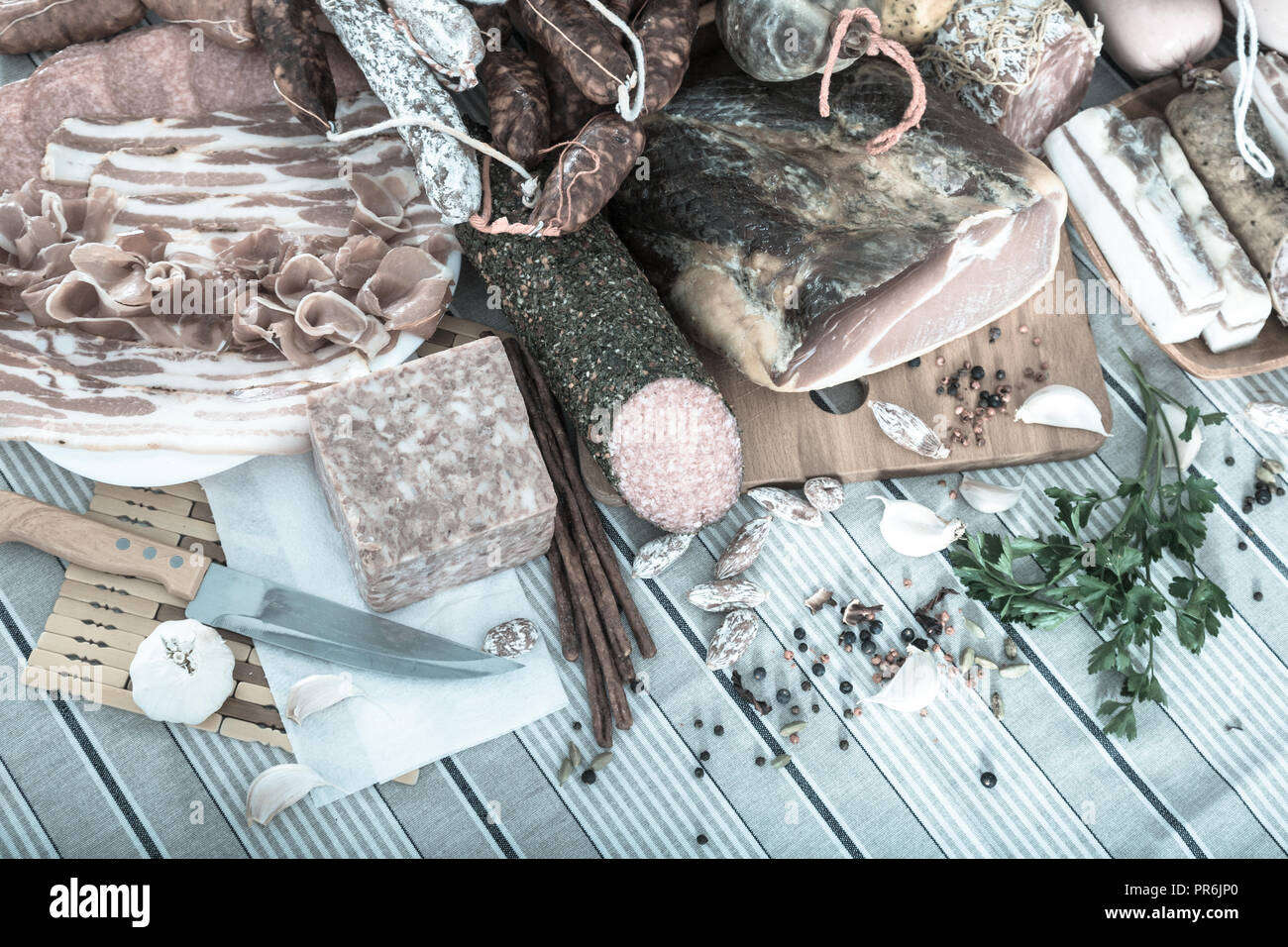 Delicious variety of meats on table Stock Photo - Alamy
