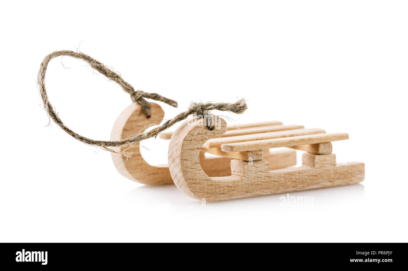 Small decorative sleds of wood isolated on white background Stock Photo ...