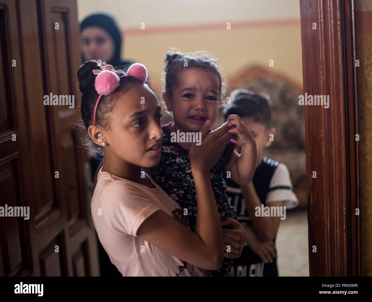 Relatives of Iyad al-Shaer seen crying during his funeral ceremony ...