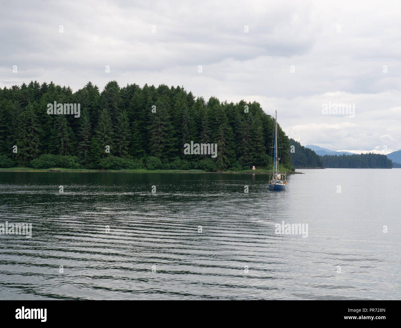 Boats On Calm Ocean Water In Alaska Stock Photo - Alamy
