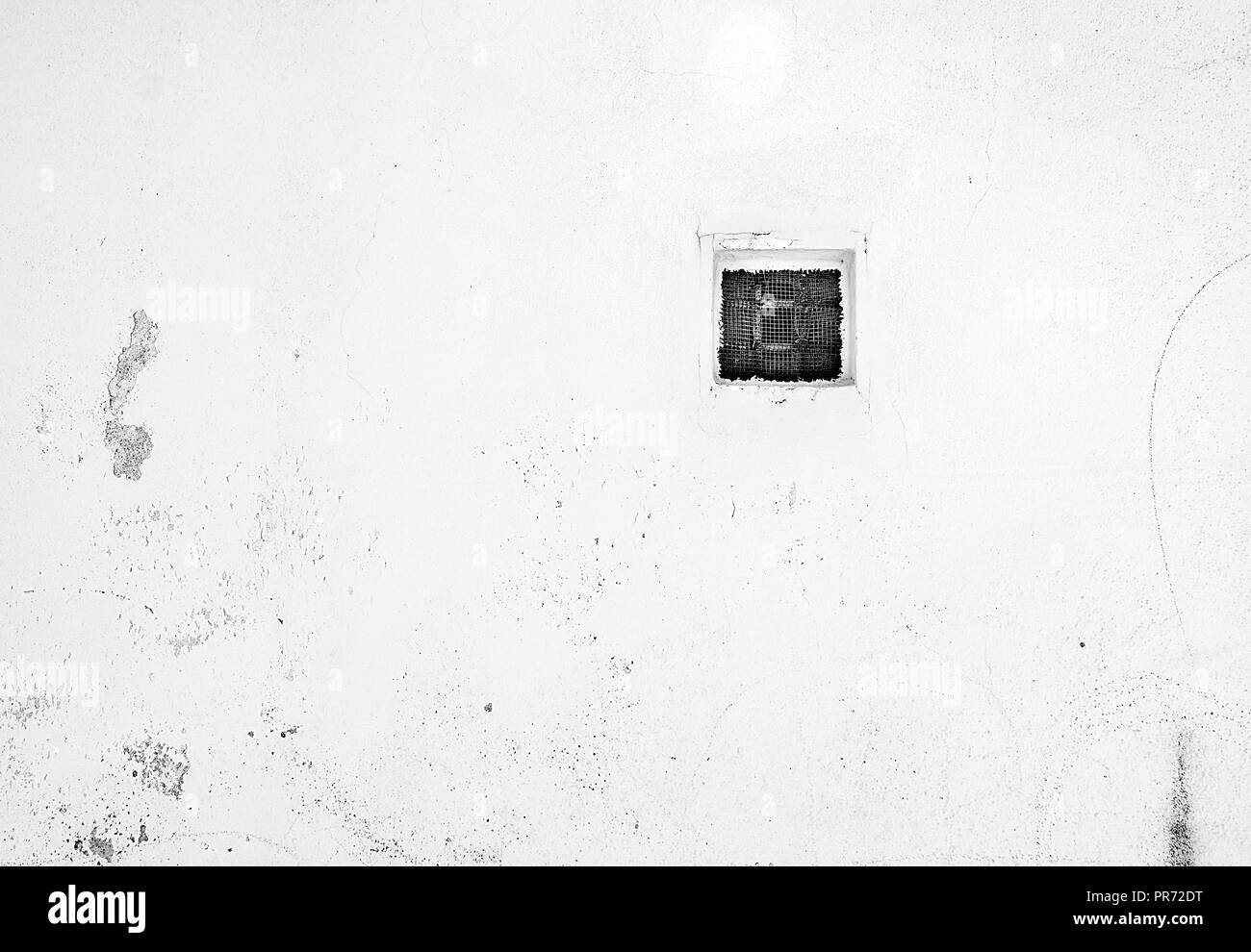 Small window on white wall Stock Photo - Alamy