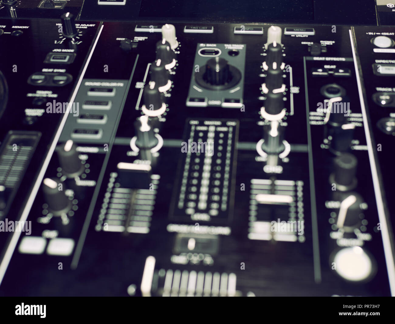 Sound mixing console detail, close up. DJ professional music console ...