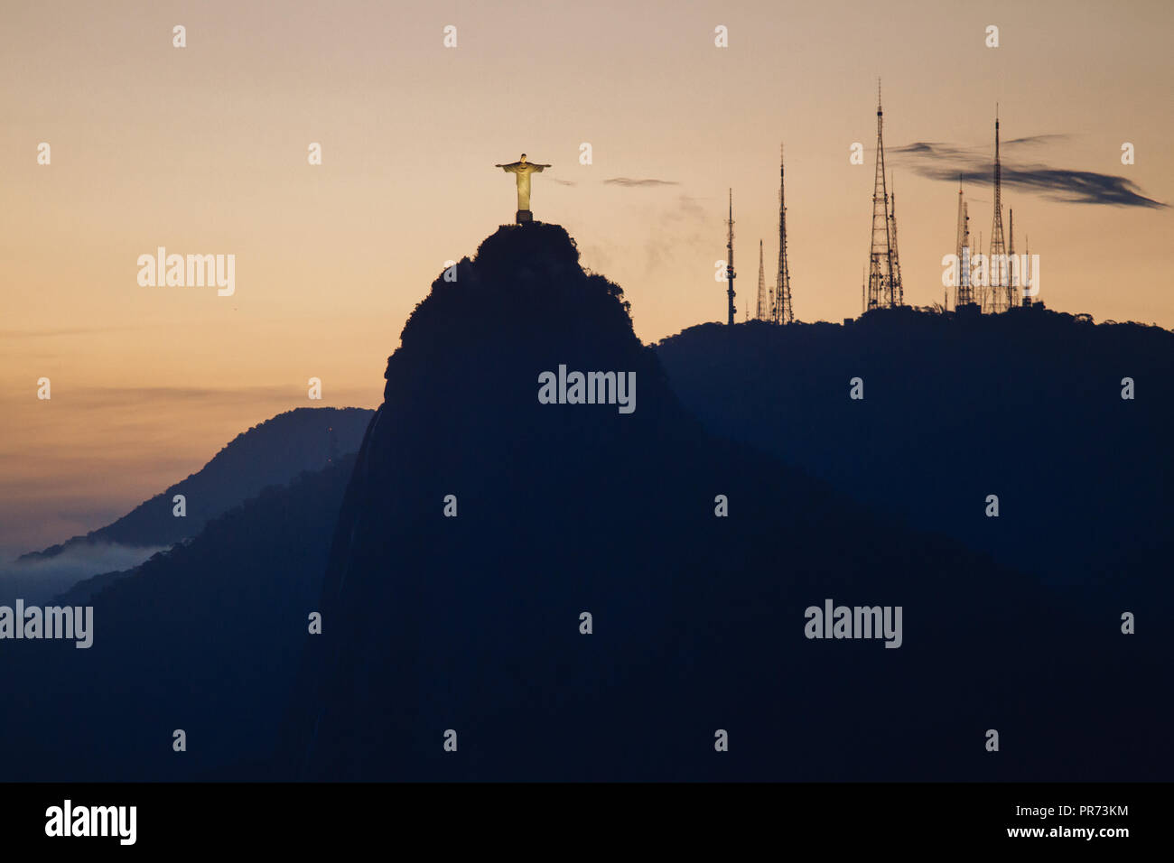 Silhouette of the Christ the Redeemer statue and neighbouring ...
