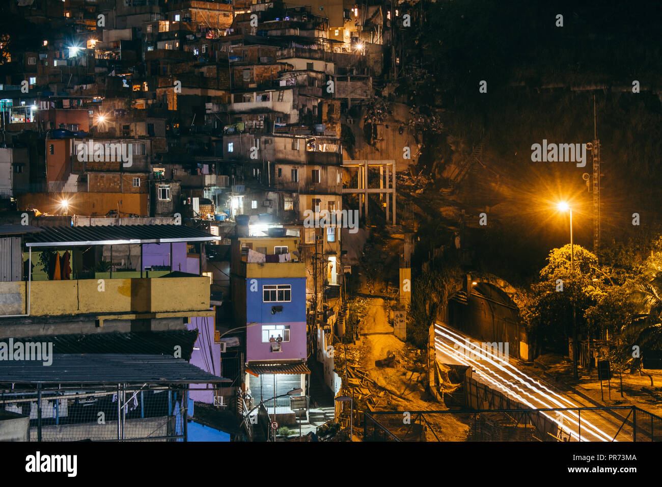 long exposure shot of the traffic through the tunnels below the Rocinha ...