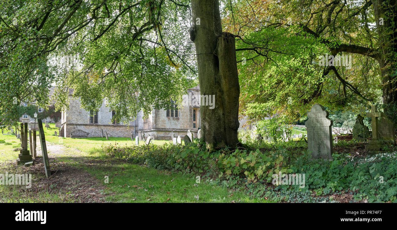 All Saints Church graveyard in early september. North Cerney, Cotswolds ...
