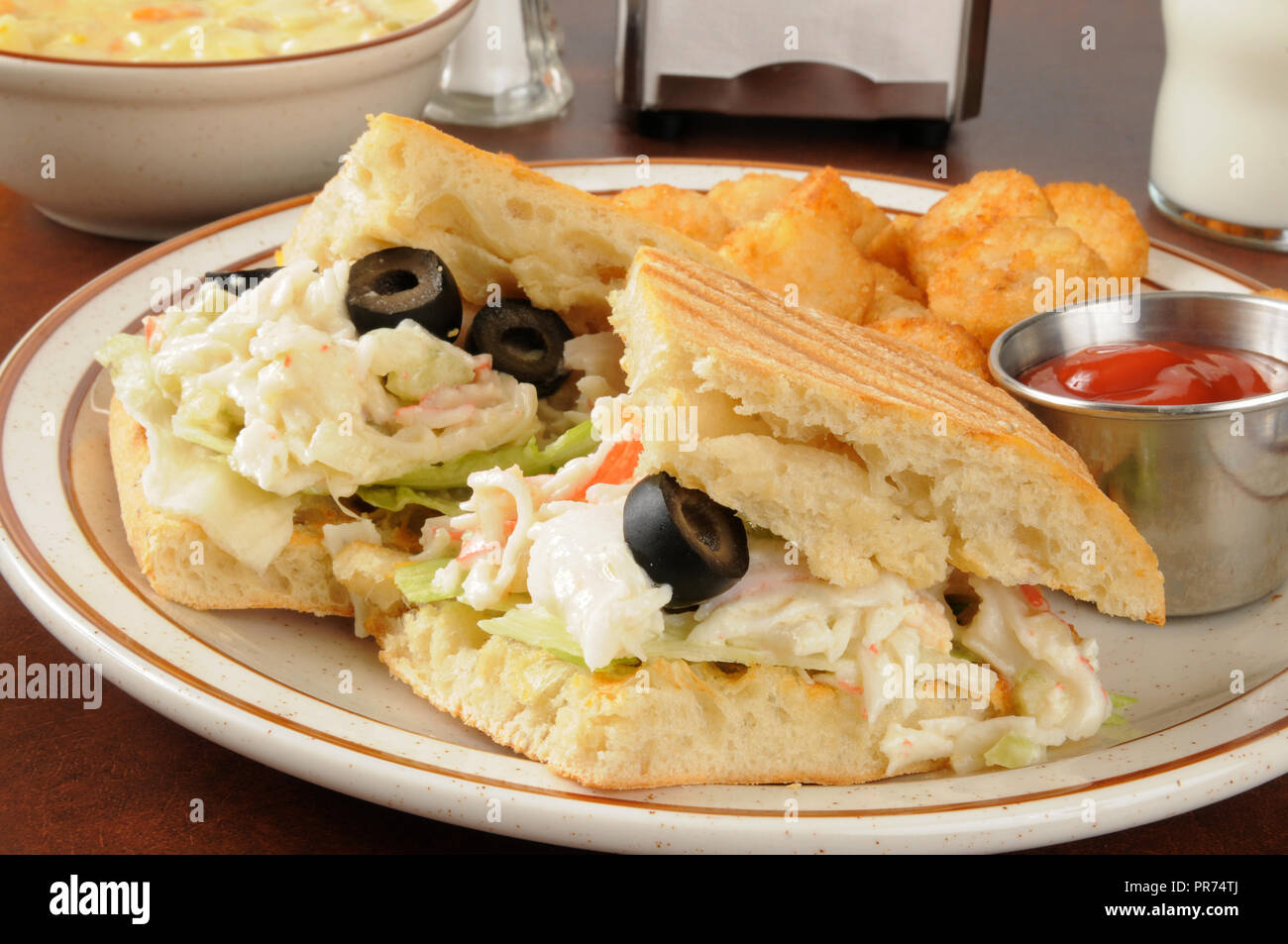A seafood sandwich with a bowl of clam chowder Stock Photo - Alamy