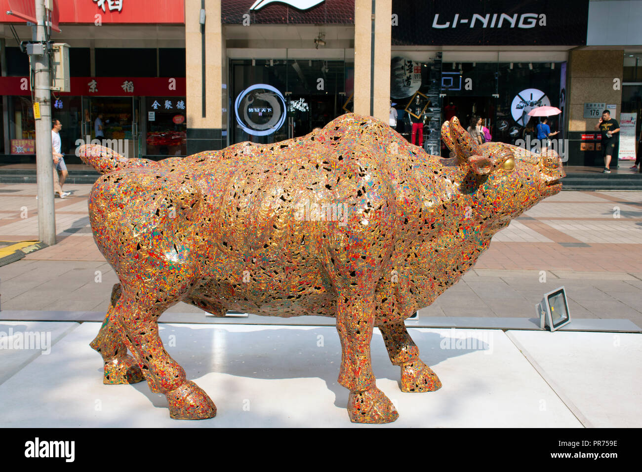 Bull statue at Wangfujing Street, Beijing, China Stock Photo - Alamy