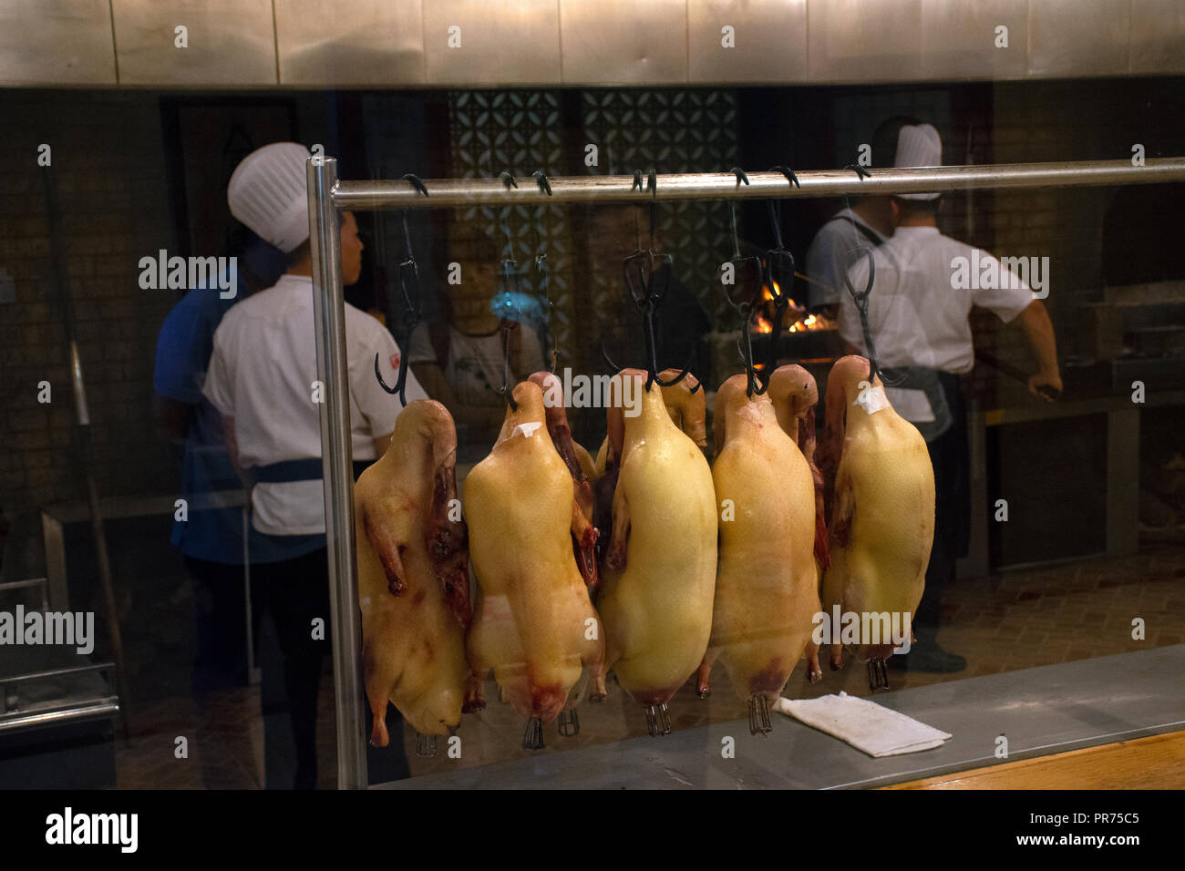 Preparation of a Peking duck, typical food of Beijing, China Stock ...