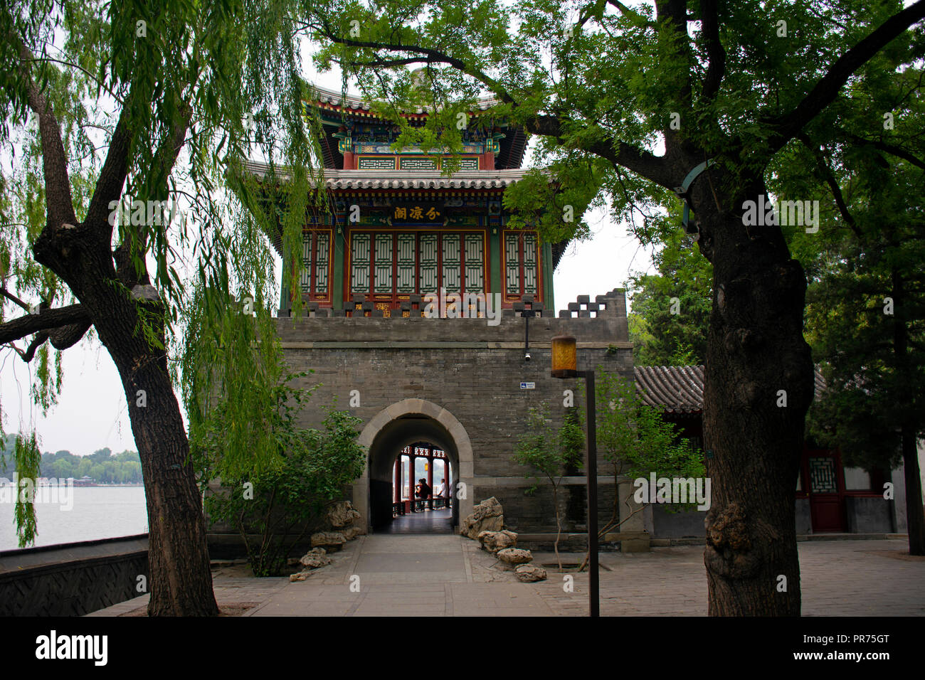 Pedestrian path with Chinese hall, Beihai Park, Beijing, China Stock ...