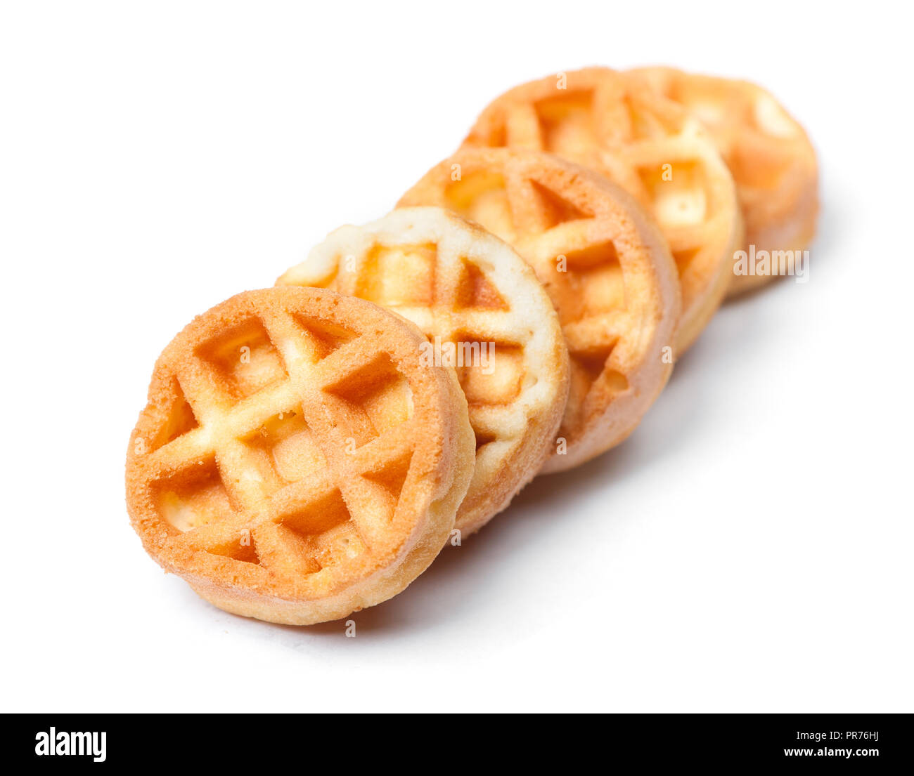 Group of tasty round mini waffles isolated on white background Stock ...