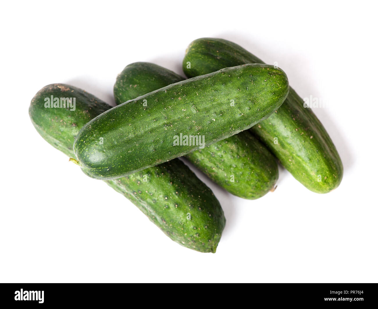 Group of natural cucumbers isolated on white background Stock Photo - Alamy