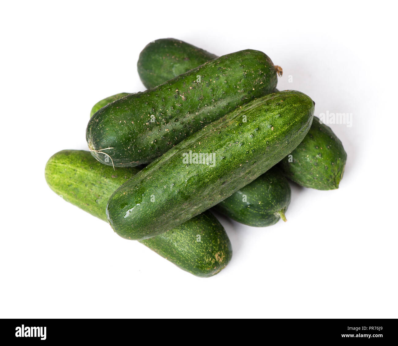 Group of natural cucumbers isolated on white background Stock Photo - Alamy