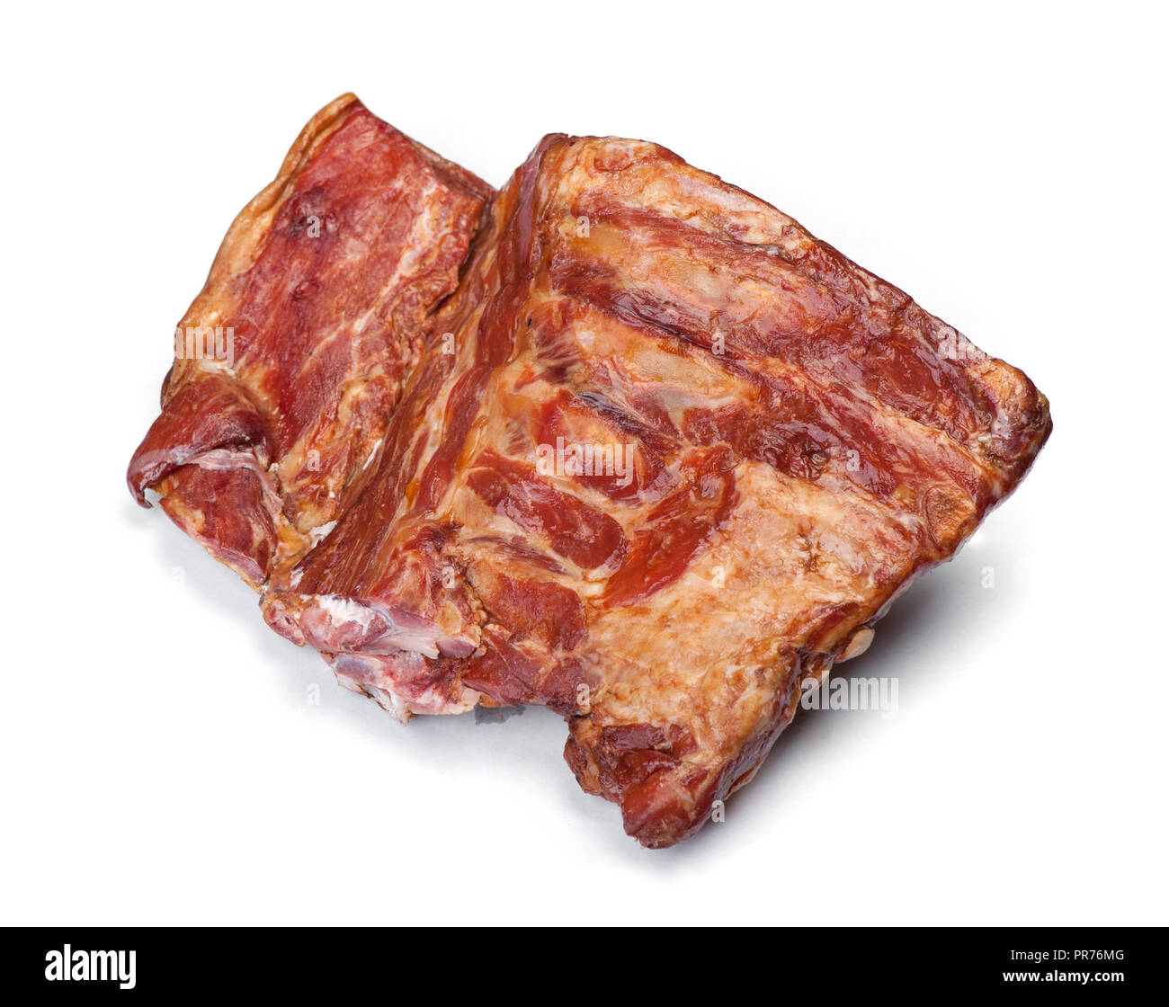Smoked pork ribs isolated on white background Stock Photo - Alamy