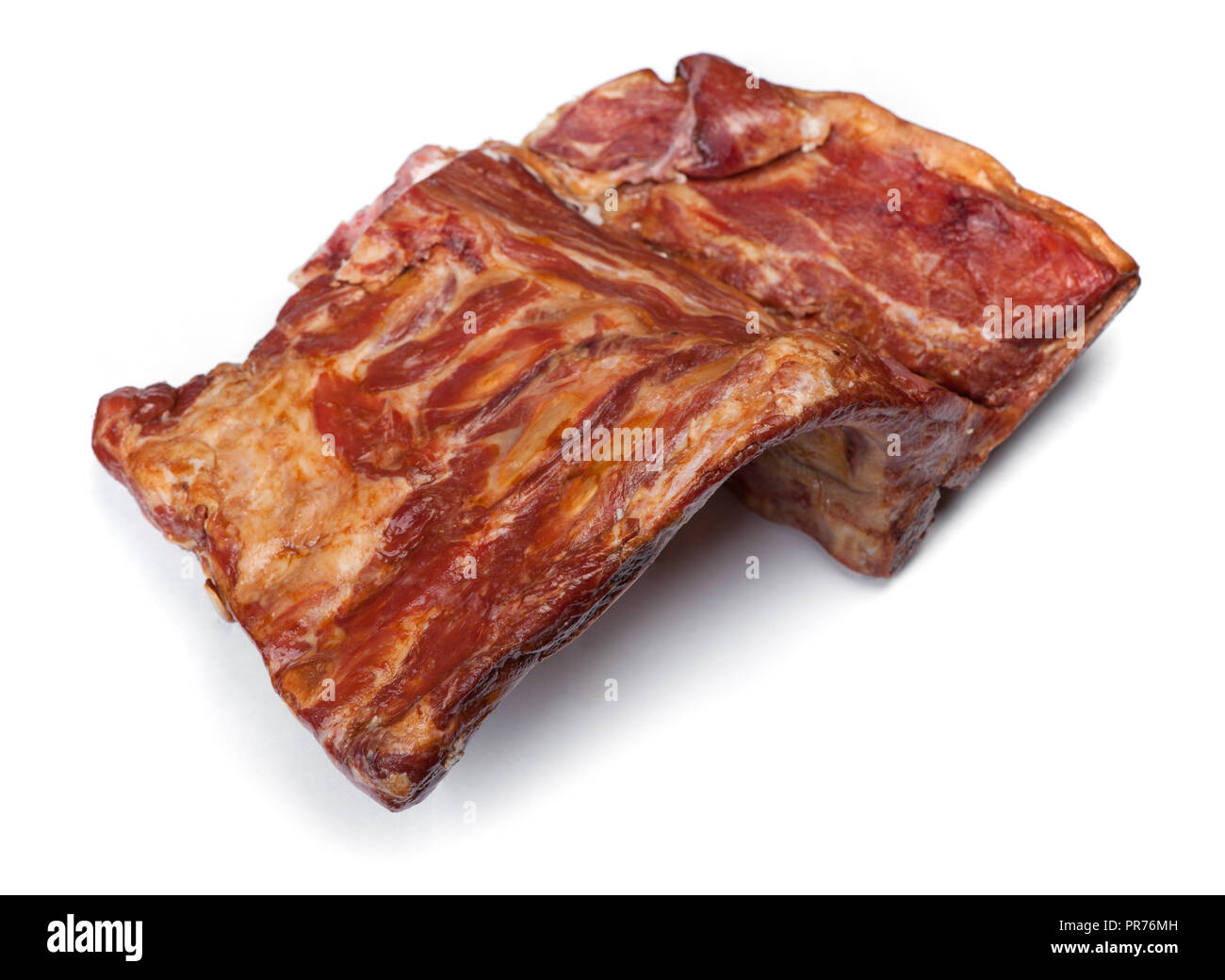 Smoked pork ribs isolated on white background Stock Photo - Alamy