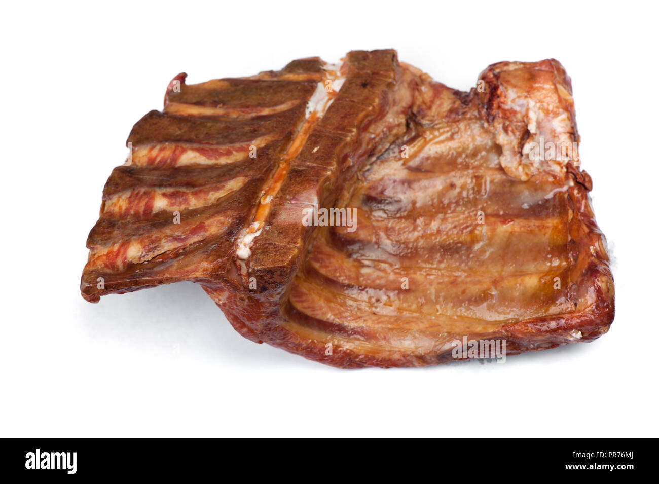 Smoked pork ribs isolated on white background Stock Photo - Alamy