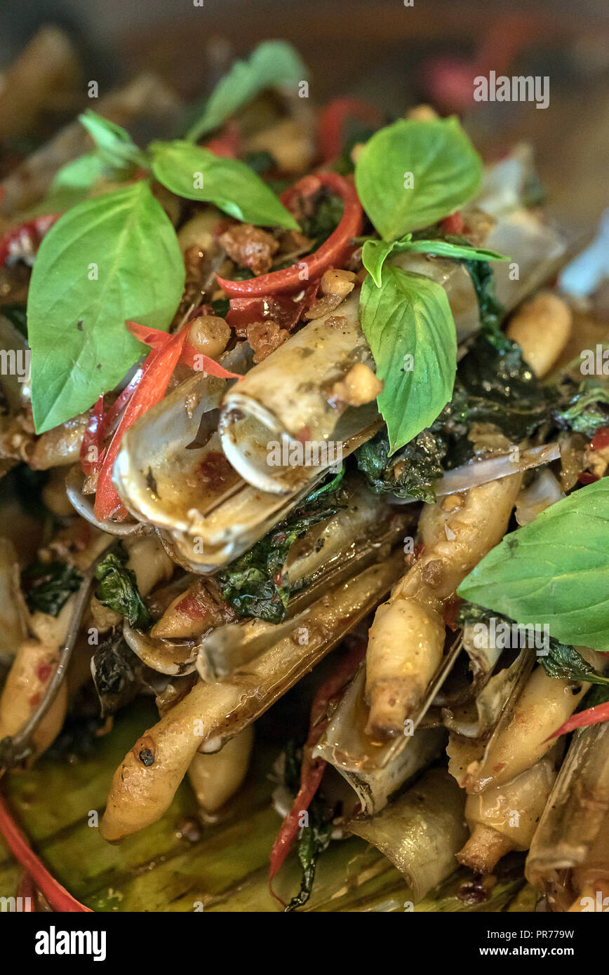 clam razor shell Solenidae stir spicy with paste and basil Stock Photo ...