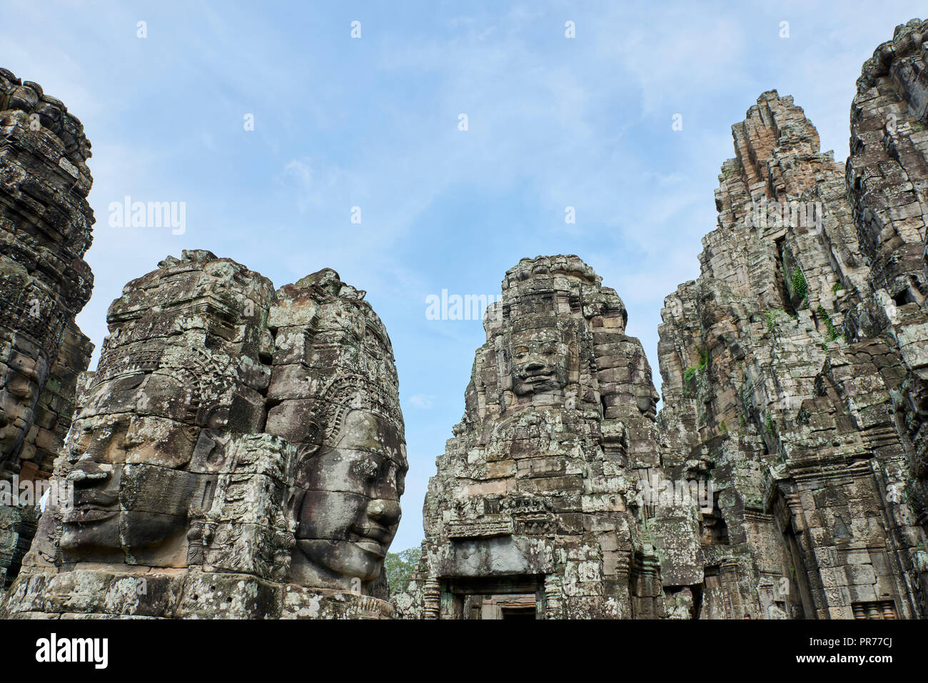 Bayon Temple ruins in Angkor Wat. The Angkor Wat complex, Built during ...